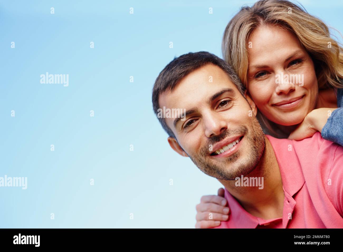 We just might be the perfect couple. Low angle portrait of an ...