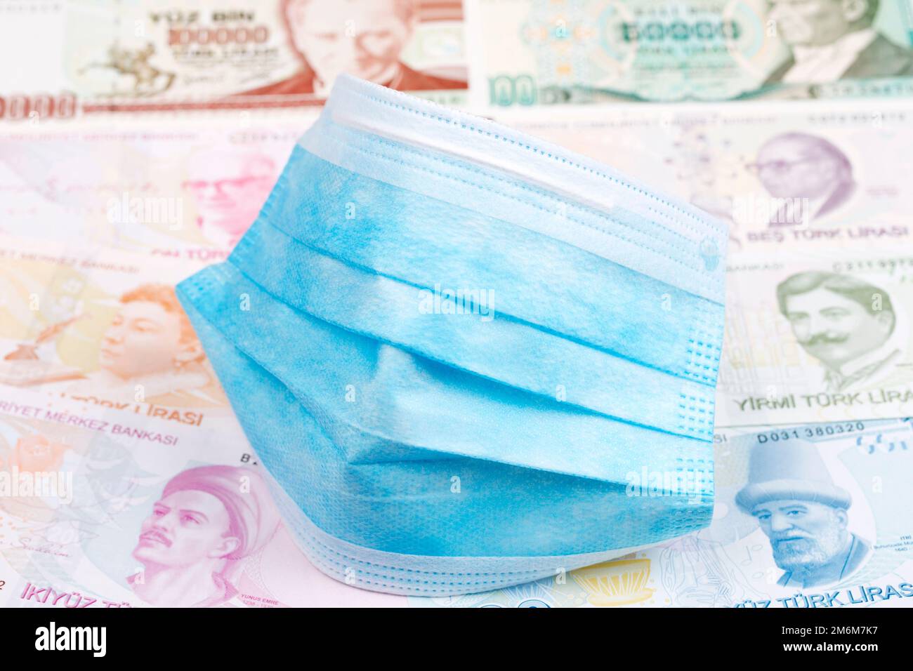 Protective mask on a Turkish money Stock Photo - Alamy