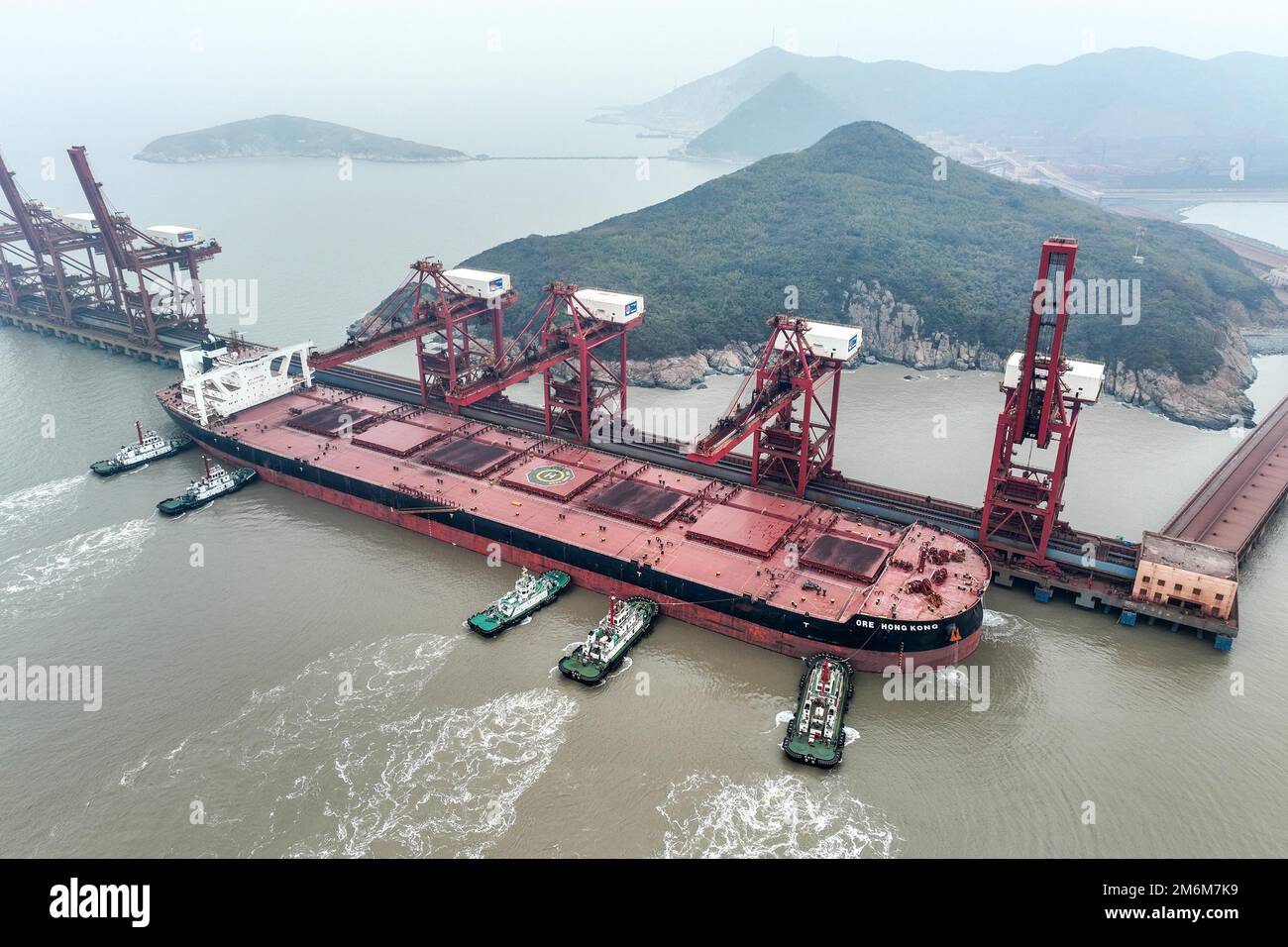 Aerial photo shows a 400,000-ton giant freighter berthing at the ...