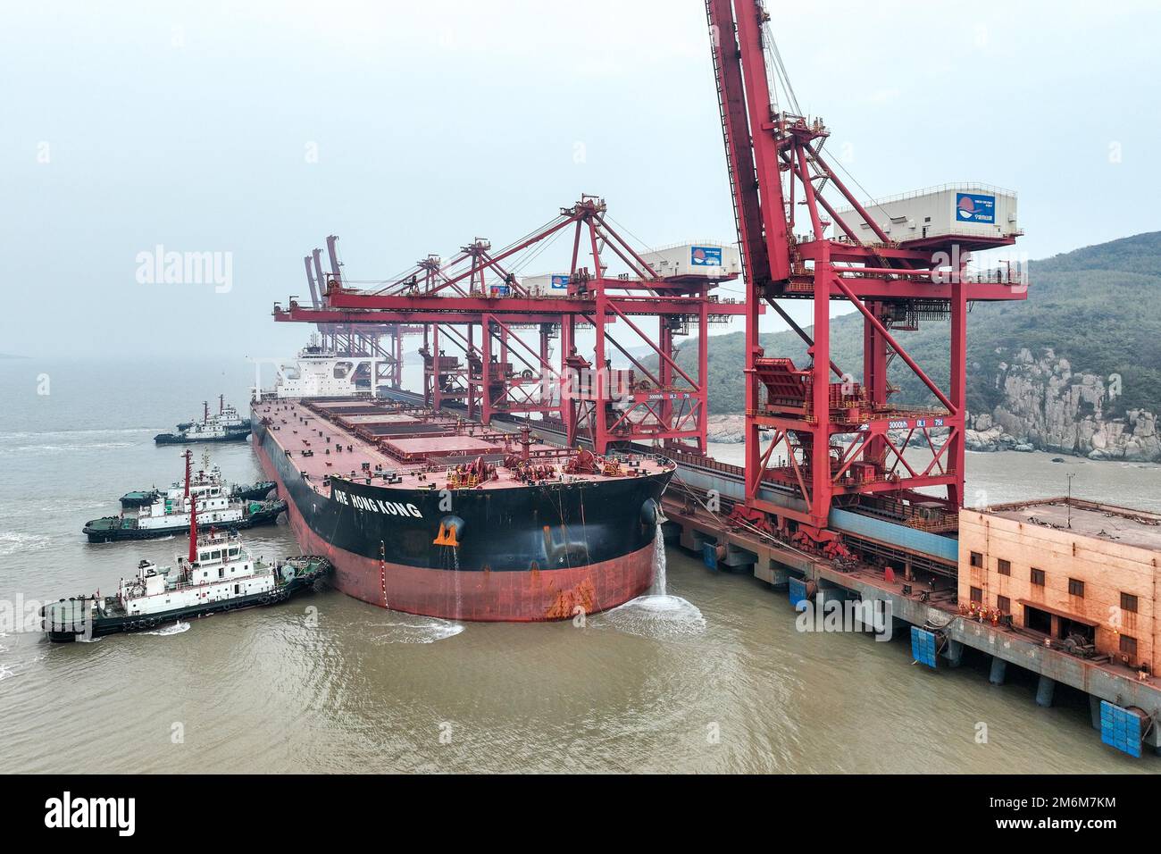Aerial photo shows a 400,000-ton giant freighter berthing at the ...