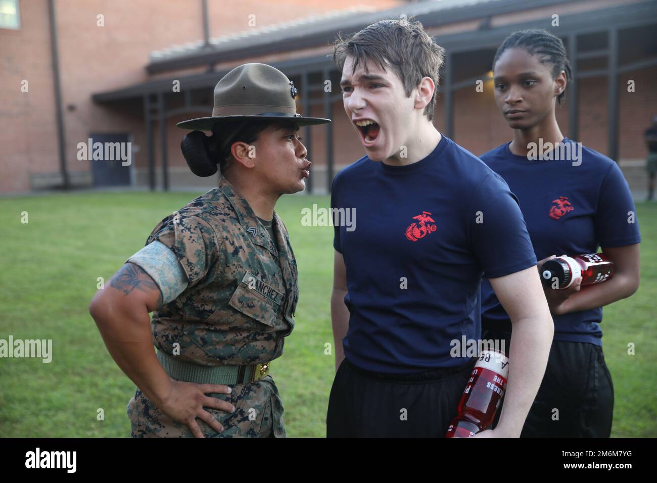 A poolee from U.S. Marine Corps Recruiting Station Baton Rouge responds to Sgt. Scarlett Sanchez ...