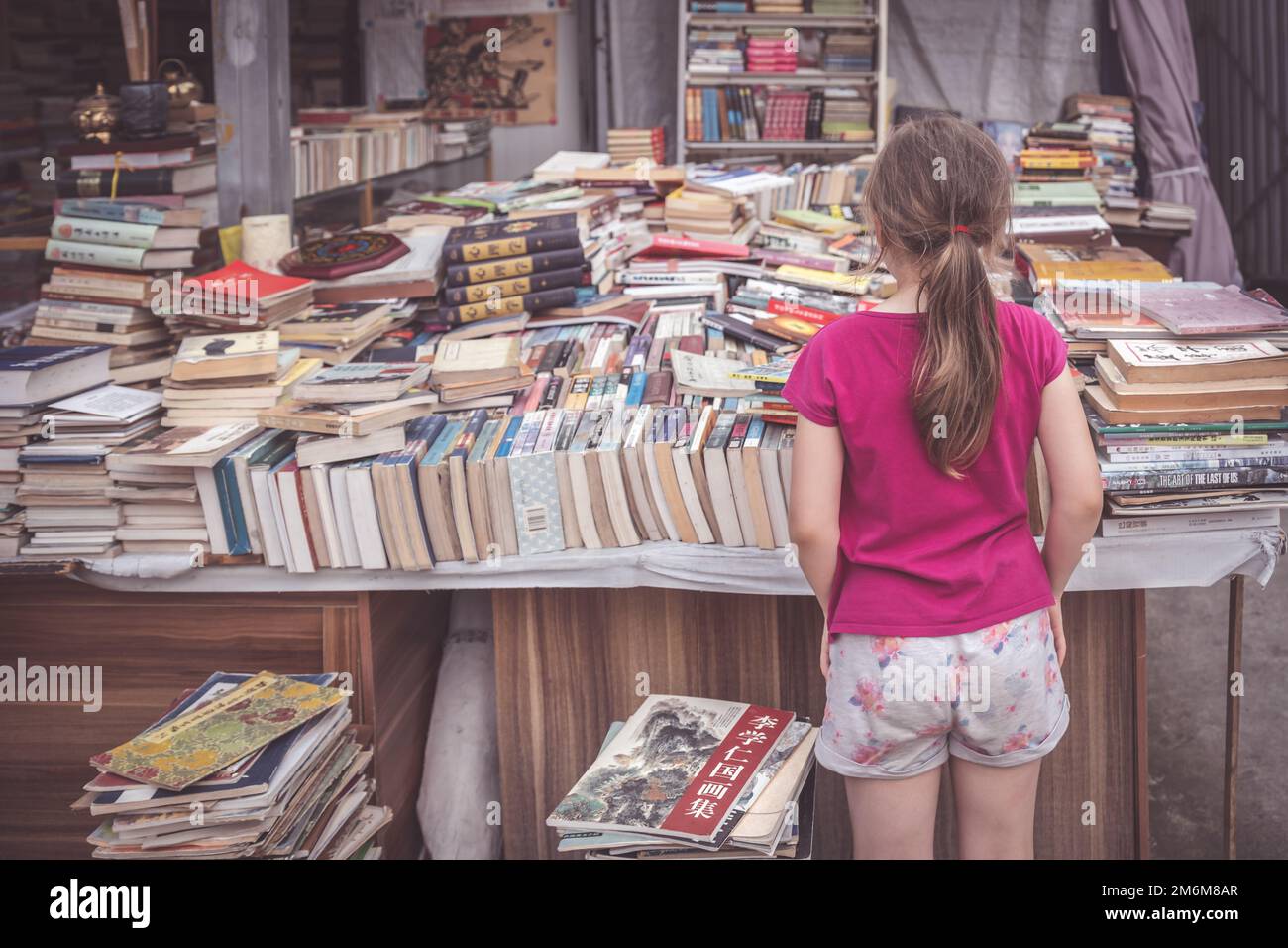 Old looking books in pile hi-res stock photography and images - Alamy