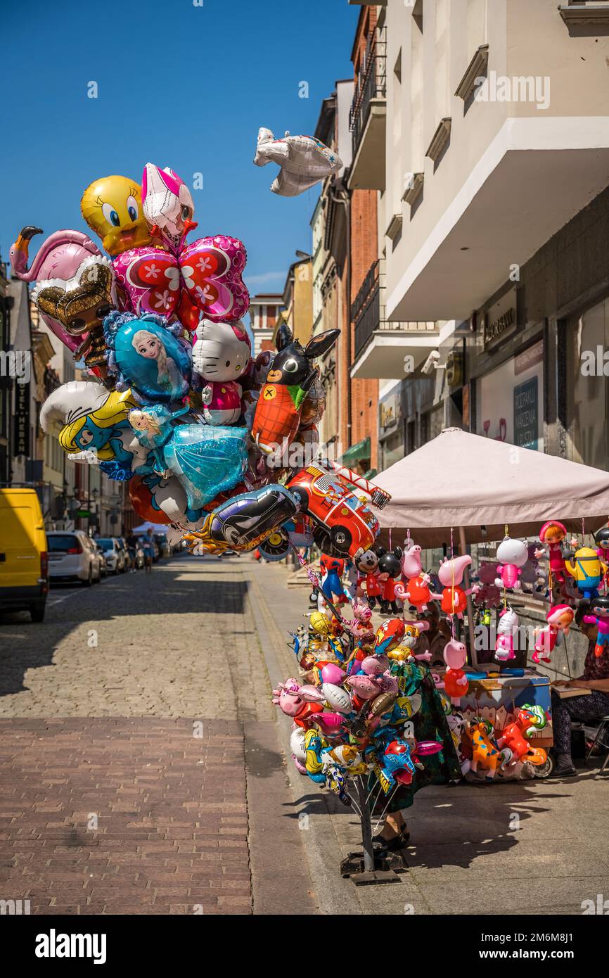 Bunch of large colorul children balloons for sale Stock Photo - Alamy