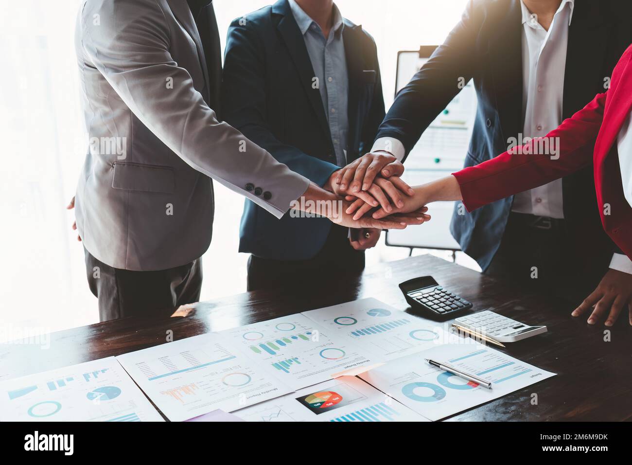 Close up Asian Business people stack of hands working together. Teamwork, Unity, business team ...