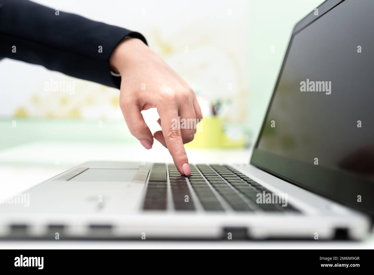 Businesswoman Typing Recent Updates On Lap Top Keyboard On Desk. Woman ...