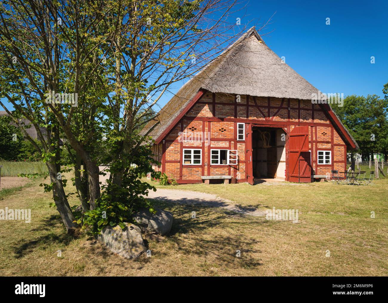 Beautiful house with a thatched roof on the Baltic Sea Stock Photo - Alamy