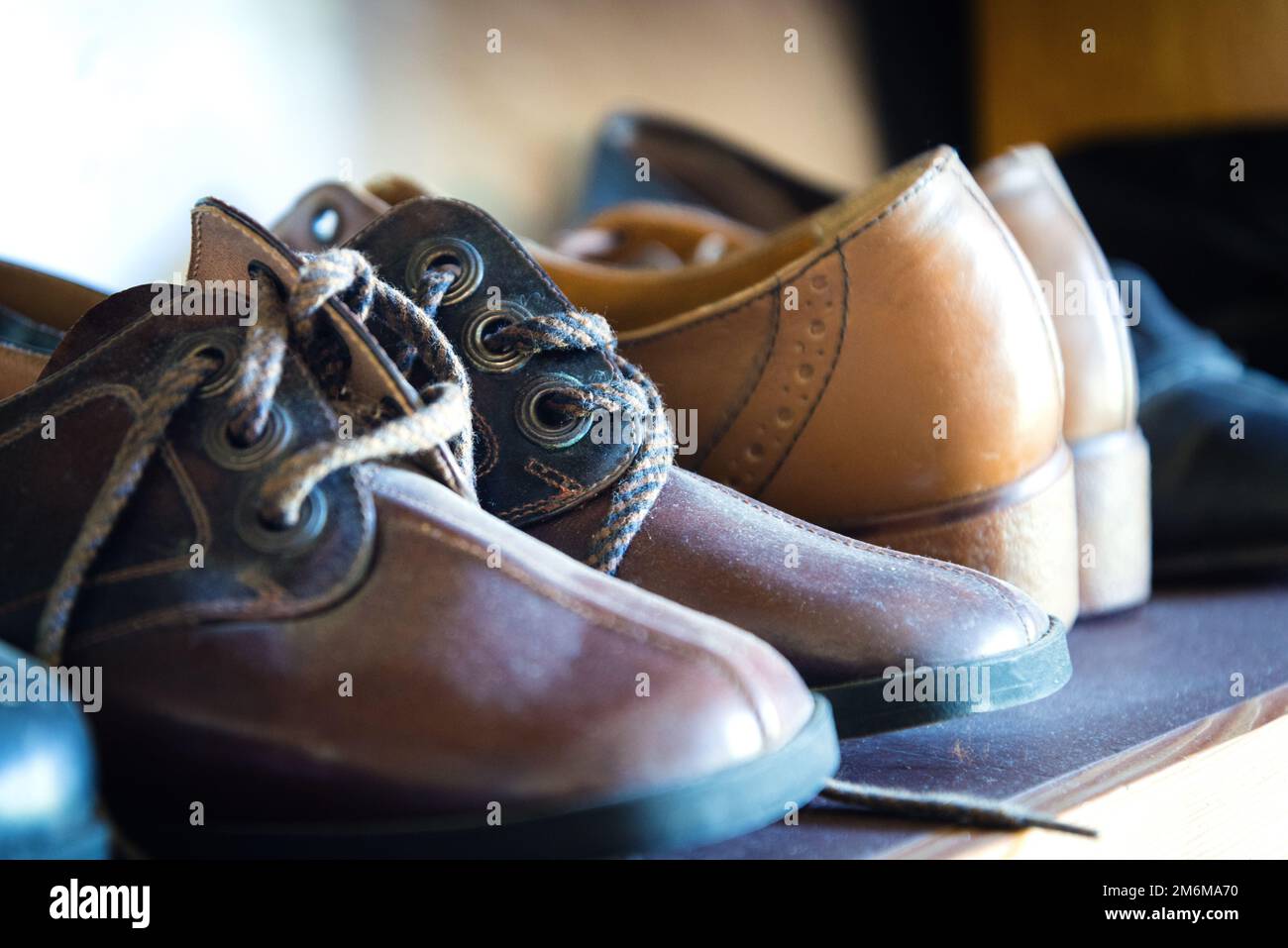 Old shoes at an historic shoemakers workplace Stock Photo - Alamy