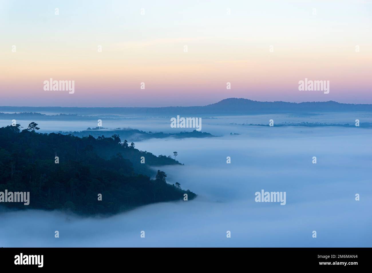 Mist. Cool atmosphere in the morning in the valley Stock Photo - Alamy