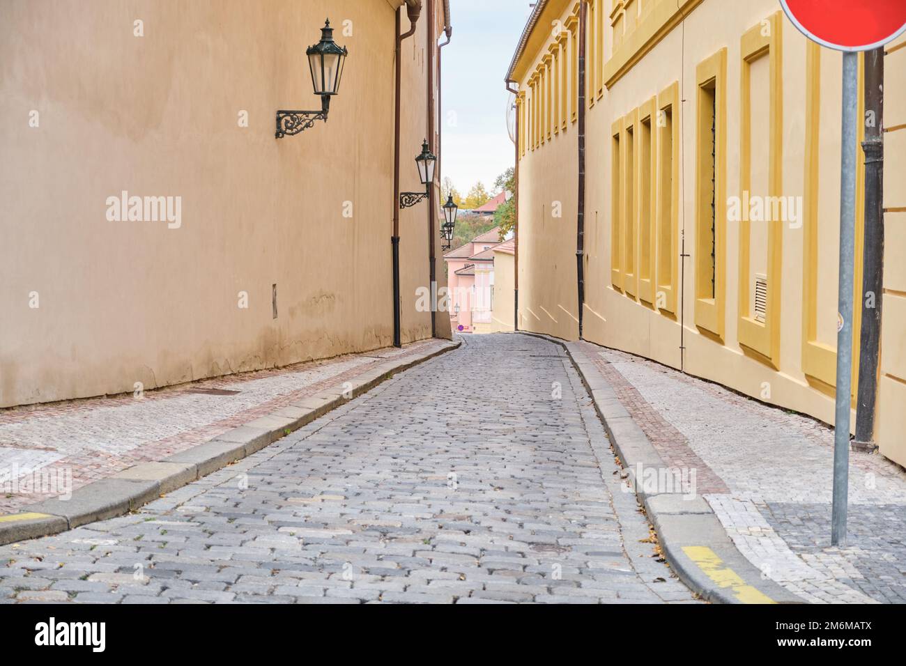 Narrow stone street pathway with buildings along it no car allowing ...