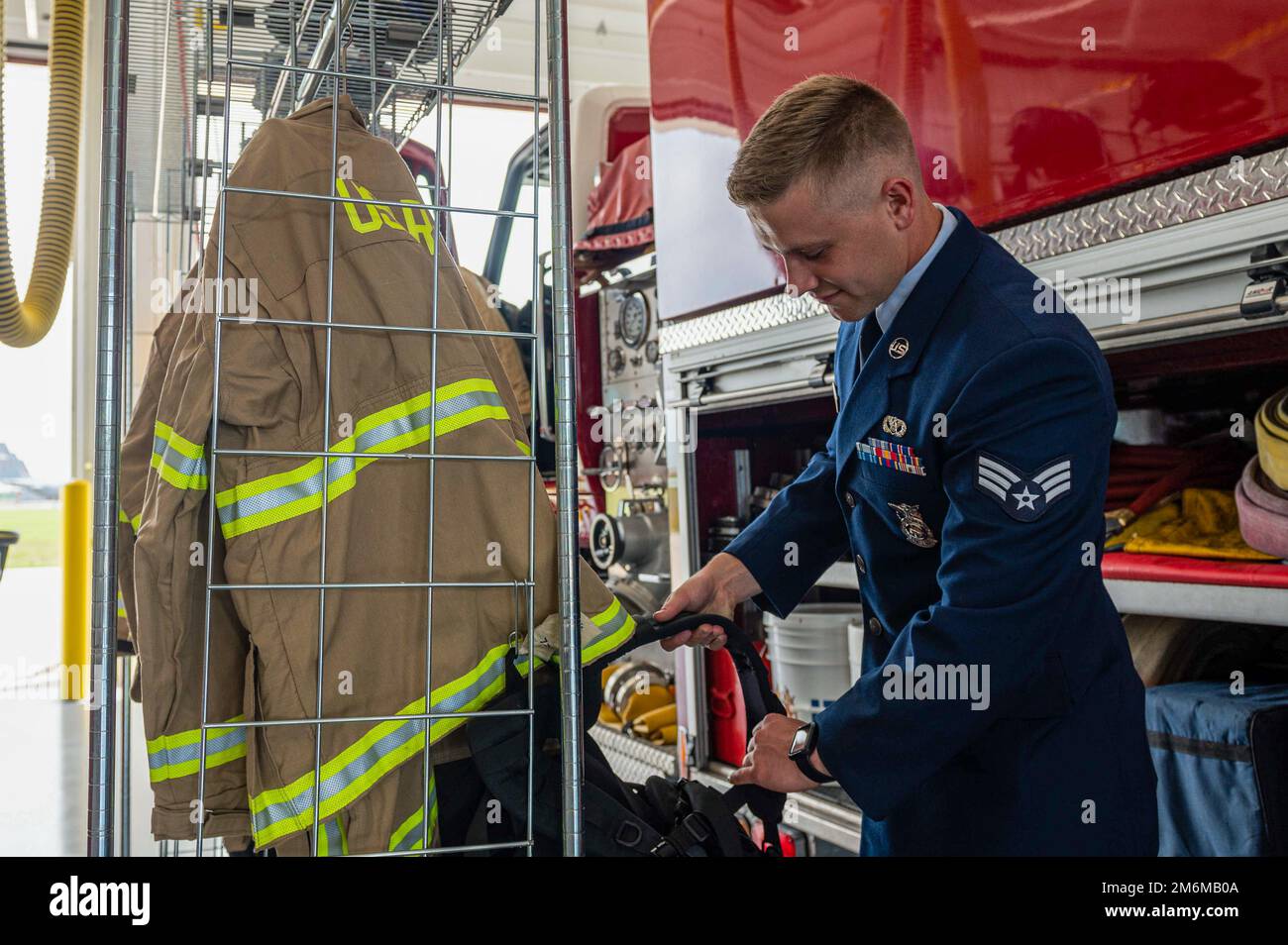 U.S. Air Force Senior Airman Andrew Watson, a fire protection ...