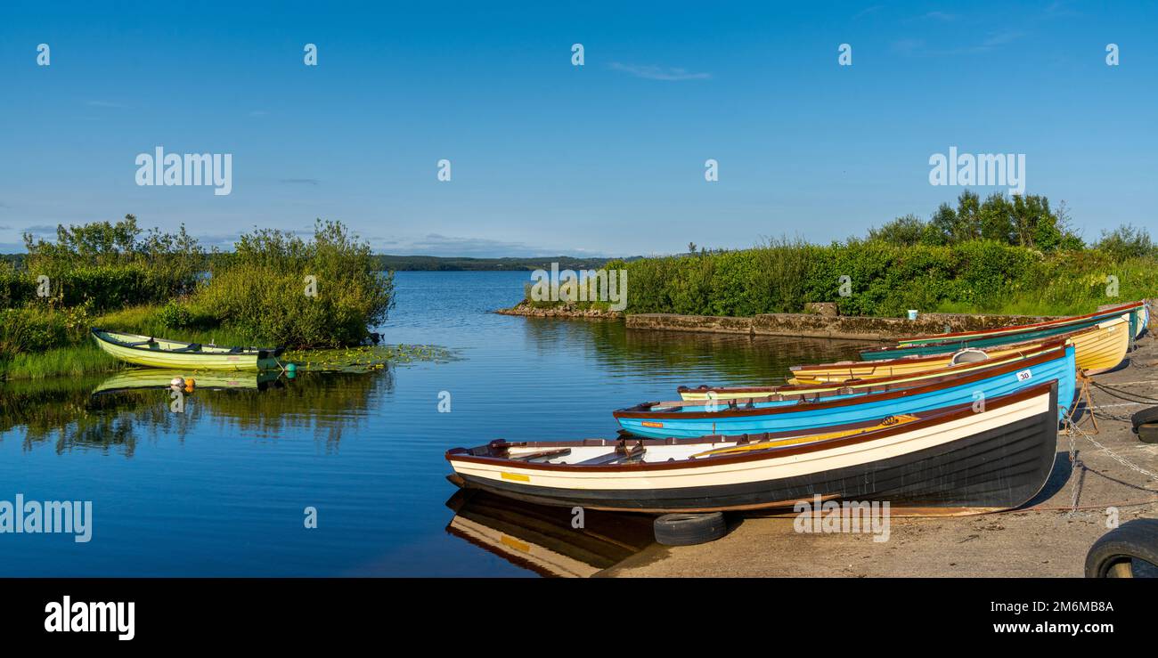 Landscape in warm evening light at Lough Melvin light with colorful ...
