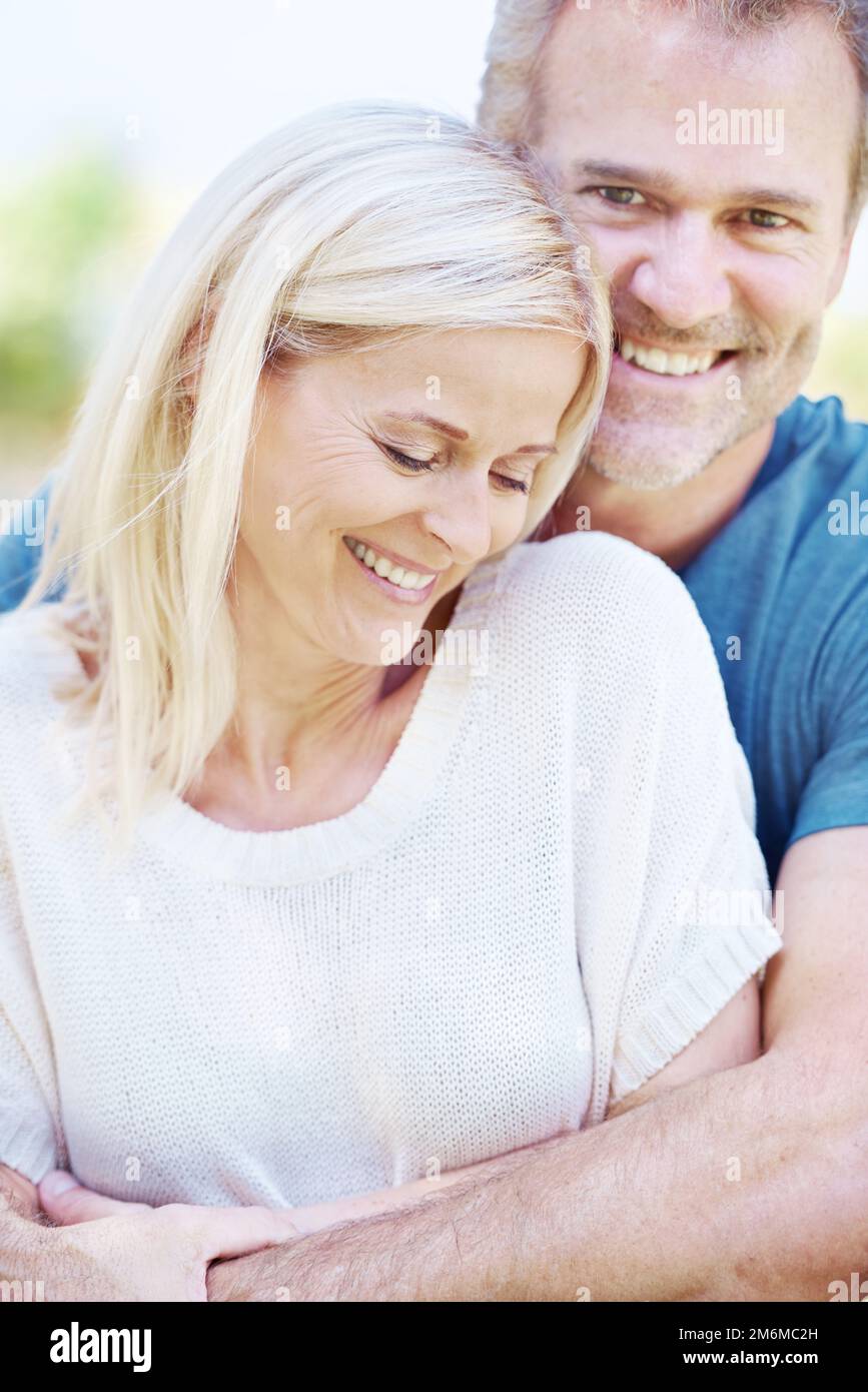 Couple hug arms hi-res stock photography and images - Alamy