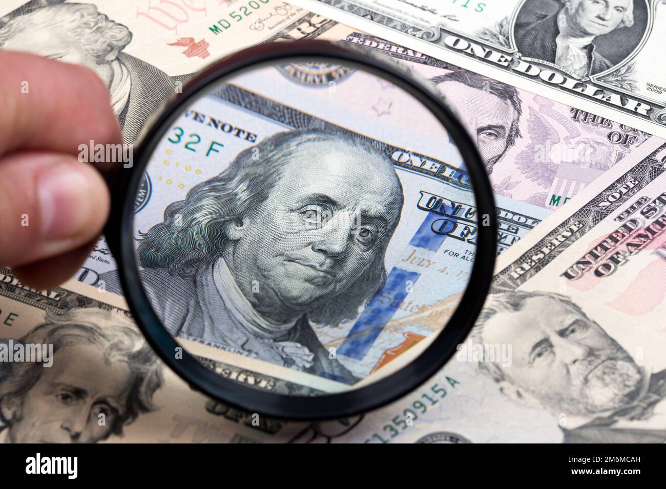 American dollars in a magnifying glass a business background Stock ...
