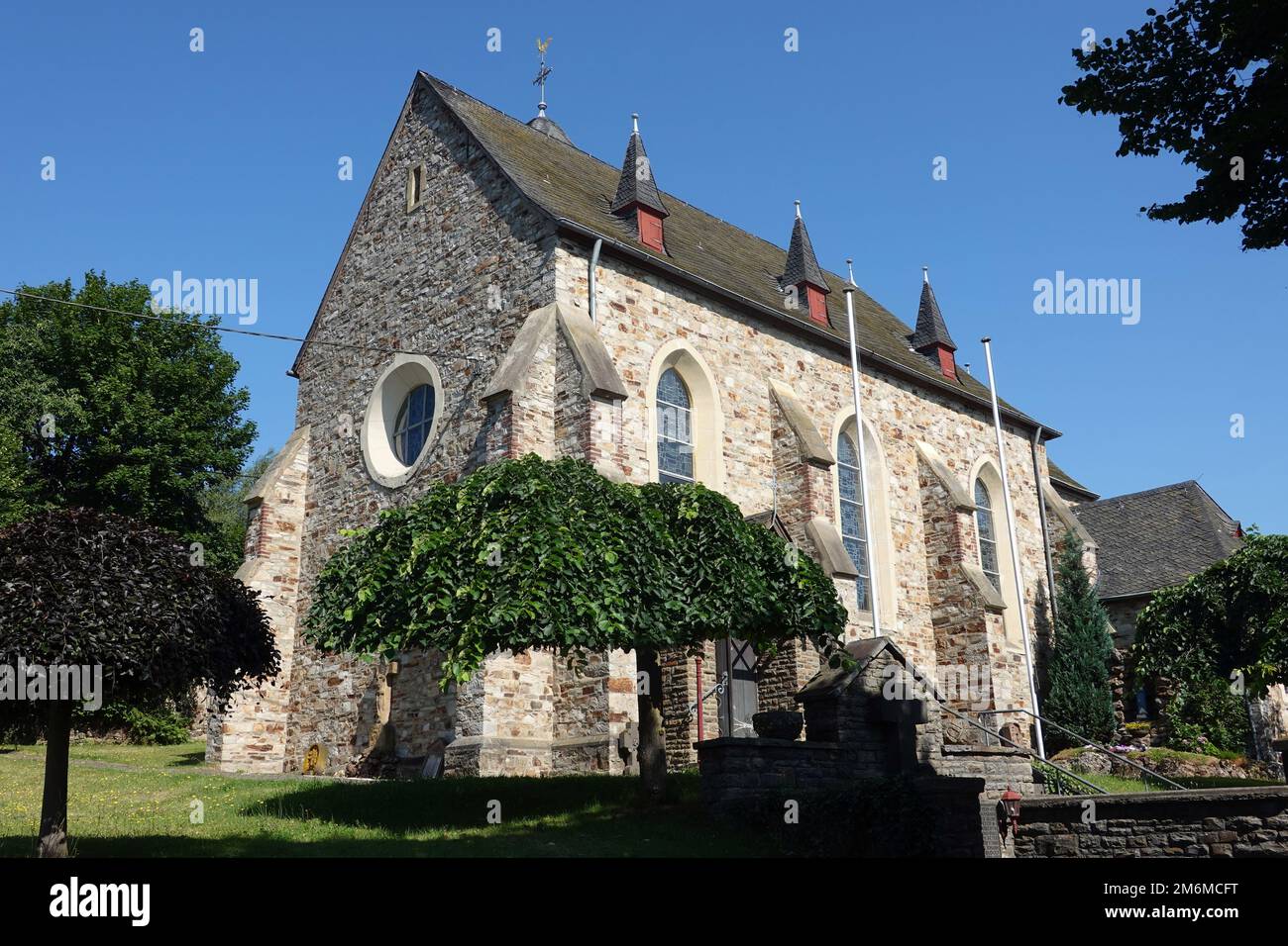 Catholic parish church Notburgis with medieval core Stock Photo - Alamy