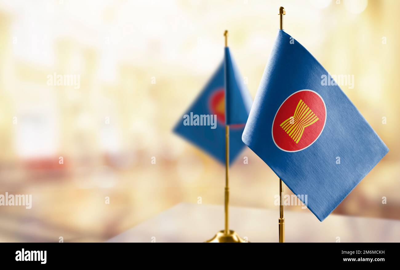 Small flags of the ASEAN on an abstract blurry background Stock Photo ...