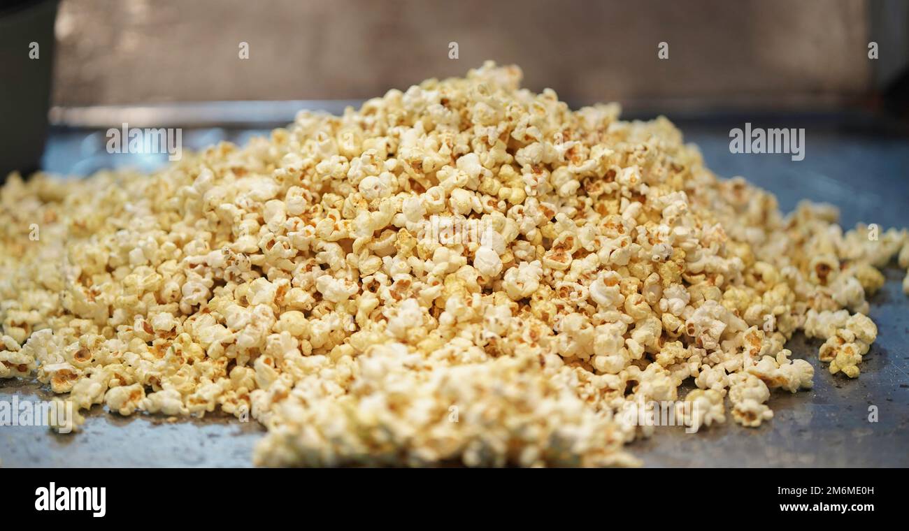 Scattered salted popcorn, texture background. Film and cinema concept ...