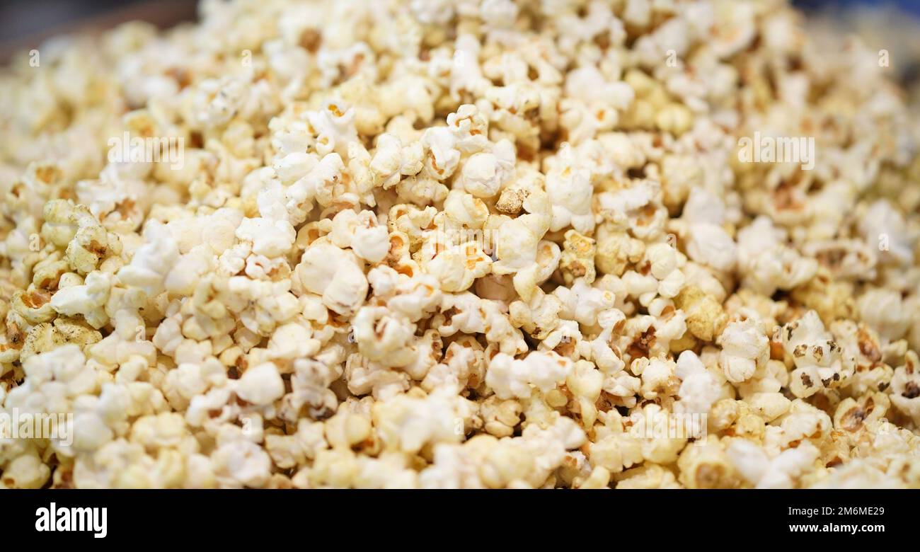 Scattered salted popcorn, Texture background. Film and cinema concept ...