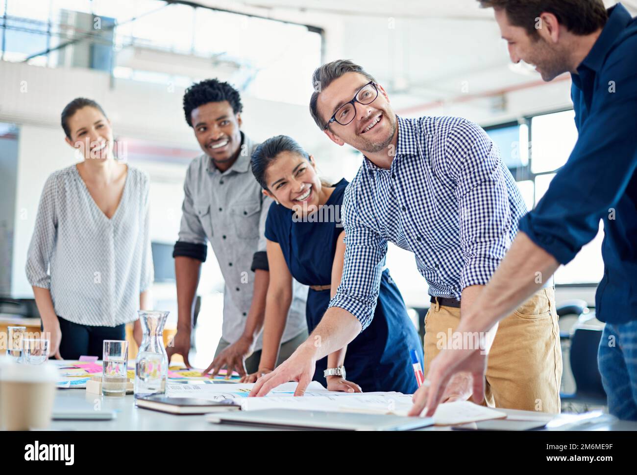 Getting input from a new perspective. Group of diverse professionals ...