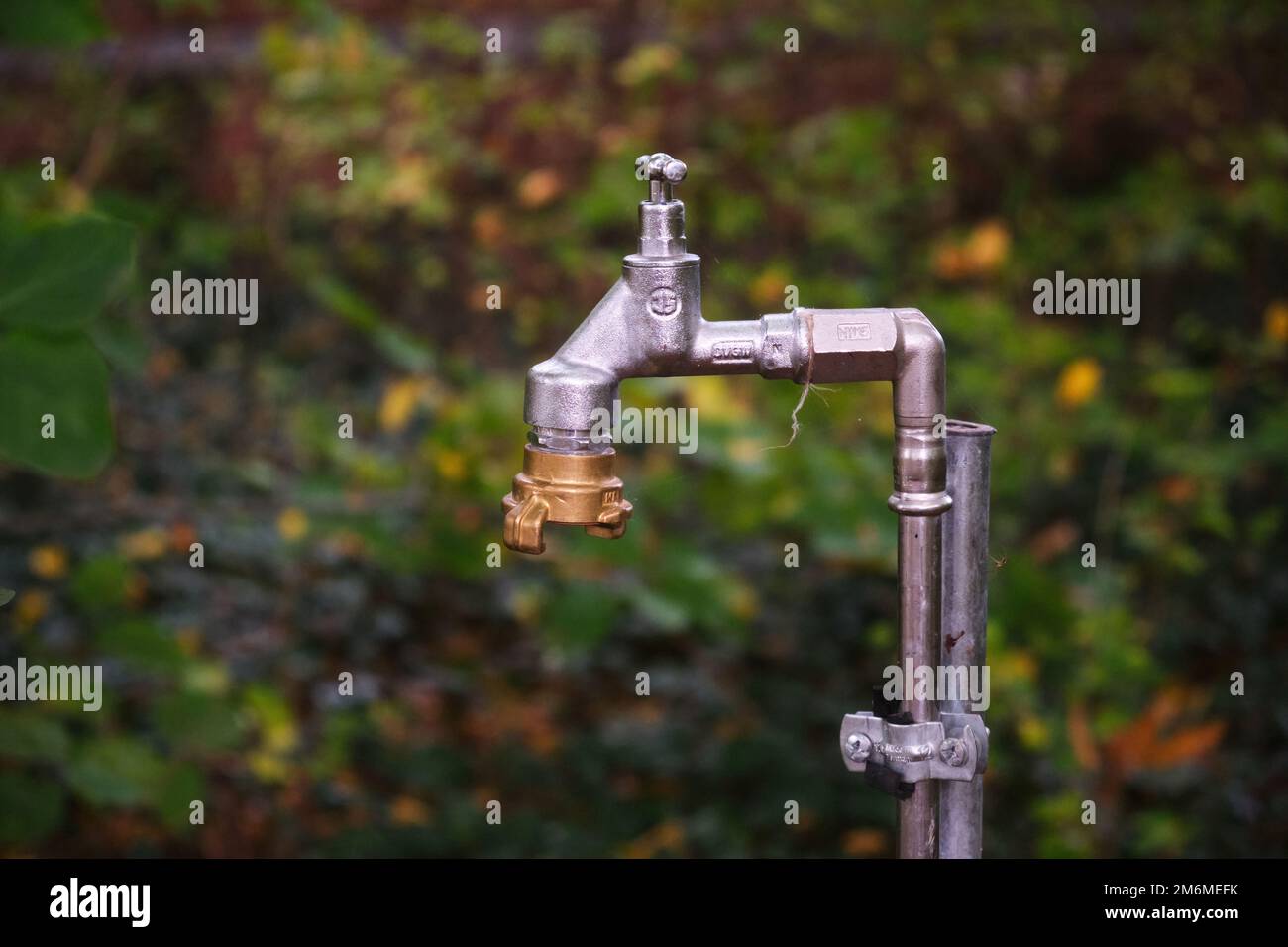 outdoor Rustic steel faucet Water tap in city park for irrigation Stock ...
