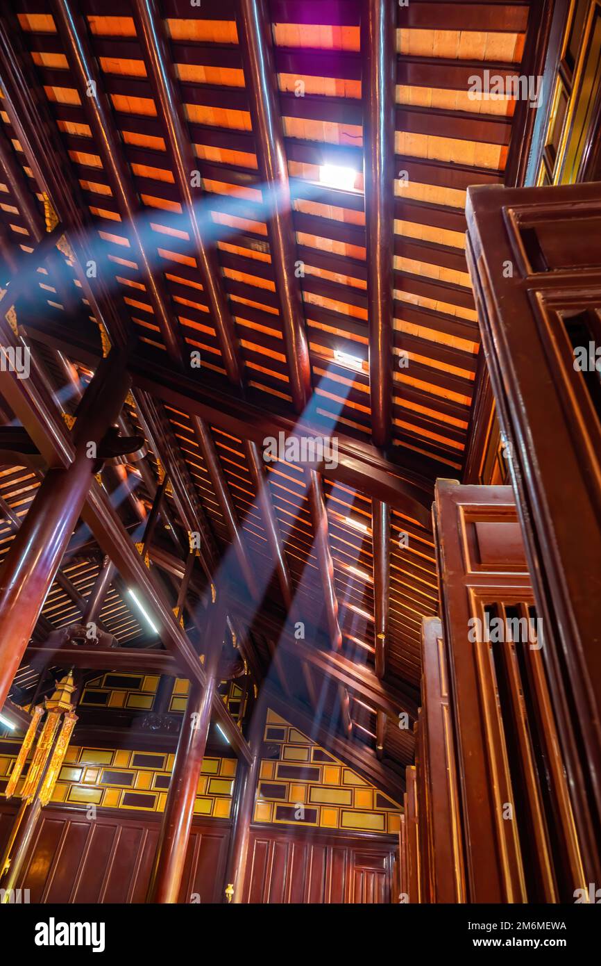 bright sun light rays shining through on floor making shadows in a ...