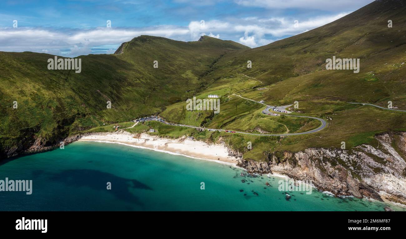 Winding clifftop road leads to picturesque Keem Bay and beach on Achill ...