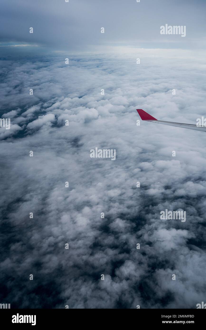 The plane under the wing of the sky Stock Photo - Alamy