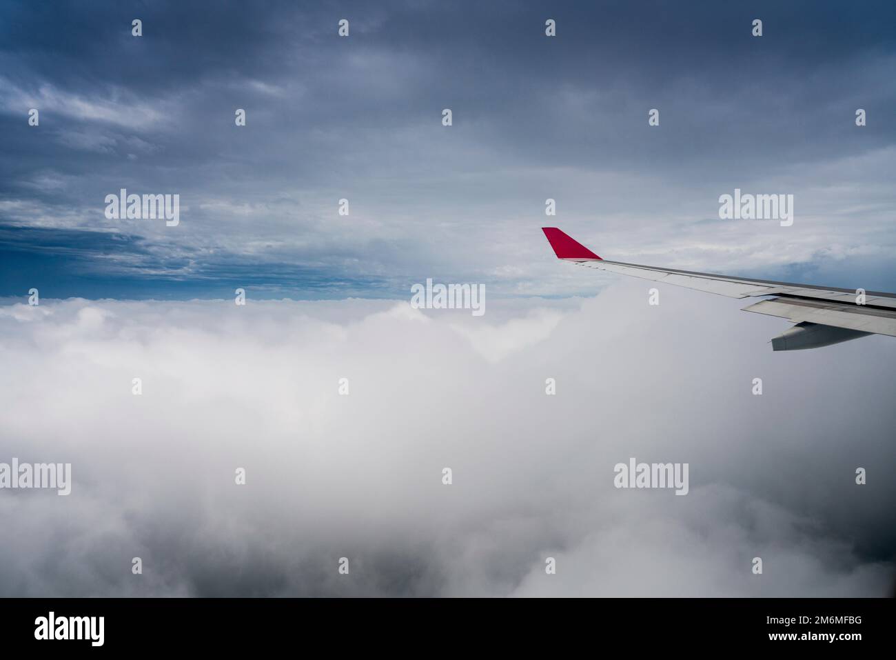 The plane under the wing of the sky Stock Photo - Alamy