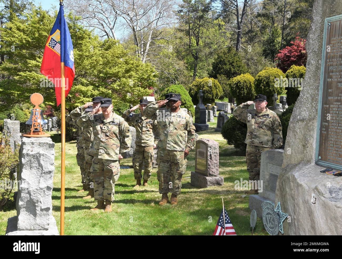 Service members from the New York Guard 56th Area Command salute during ...