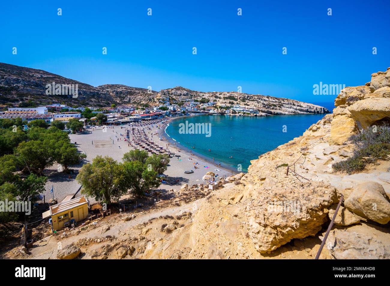 Famous Matala beach with caves, known for hippies in the 70's. View of ...