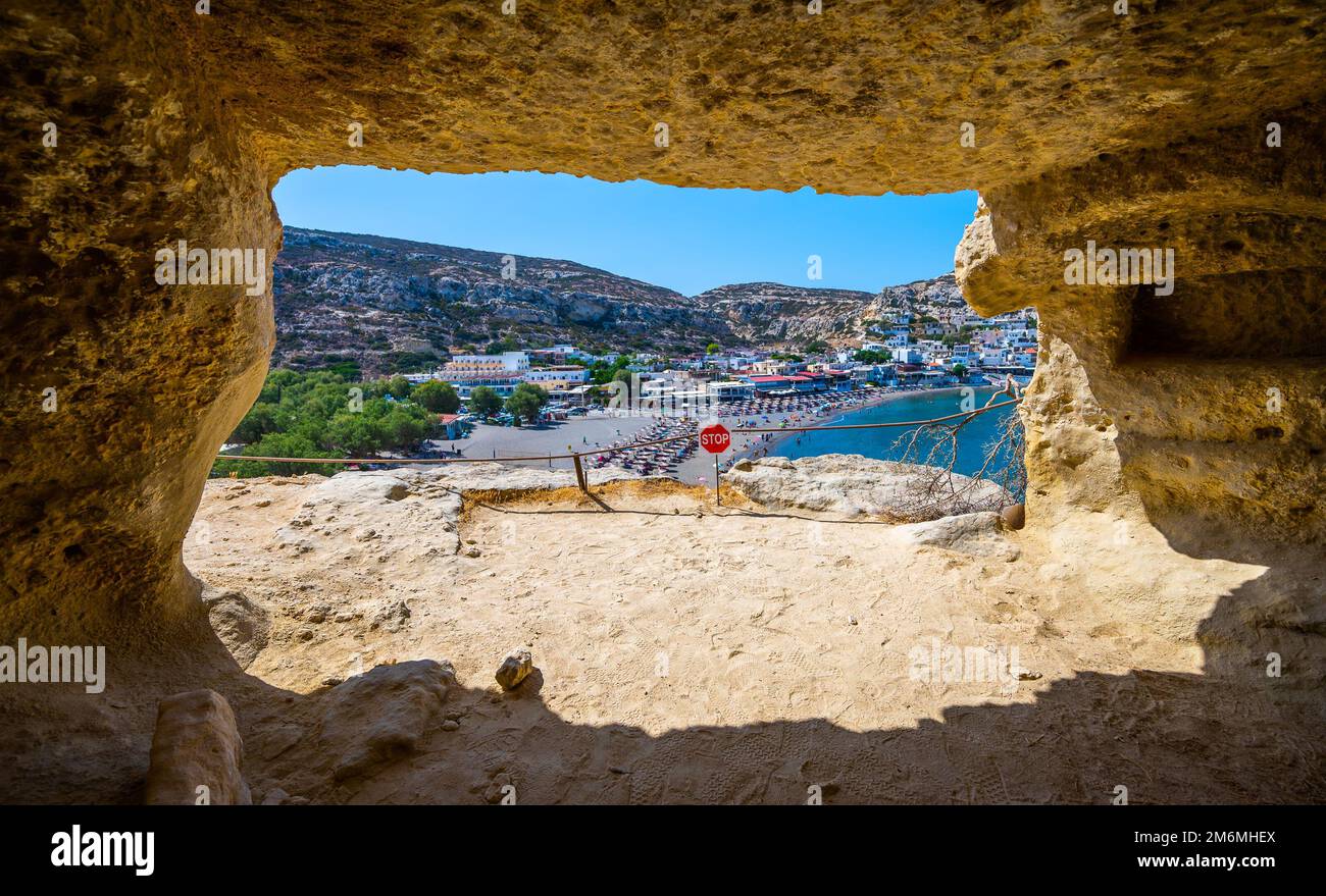 Famous Matala beach with caves, known for hippies in the 70's. View of ...