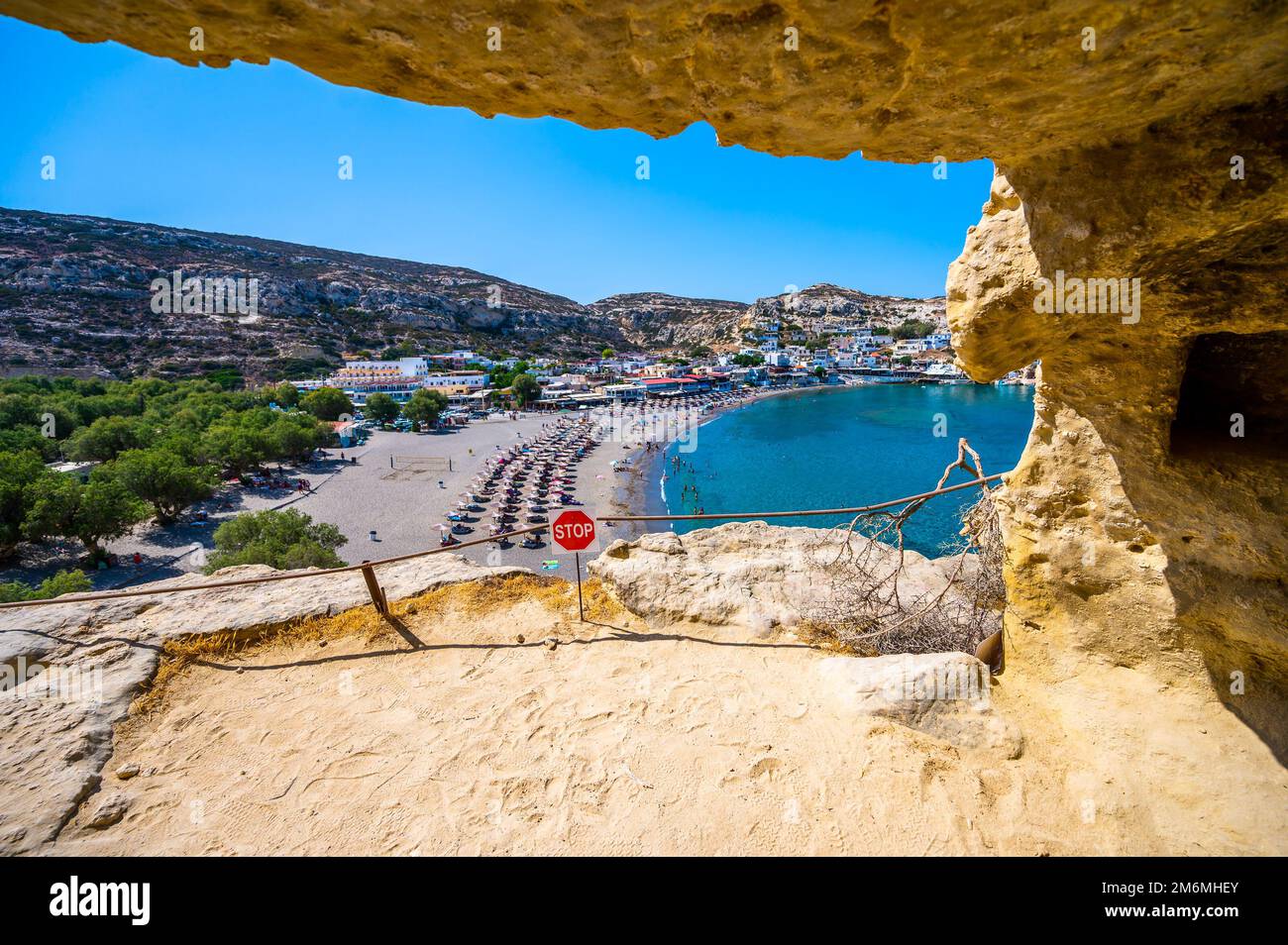 Famous Matala beach with caves, known for hippies in the 70's. View of ...