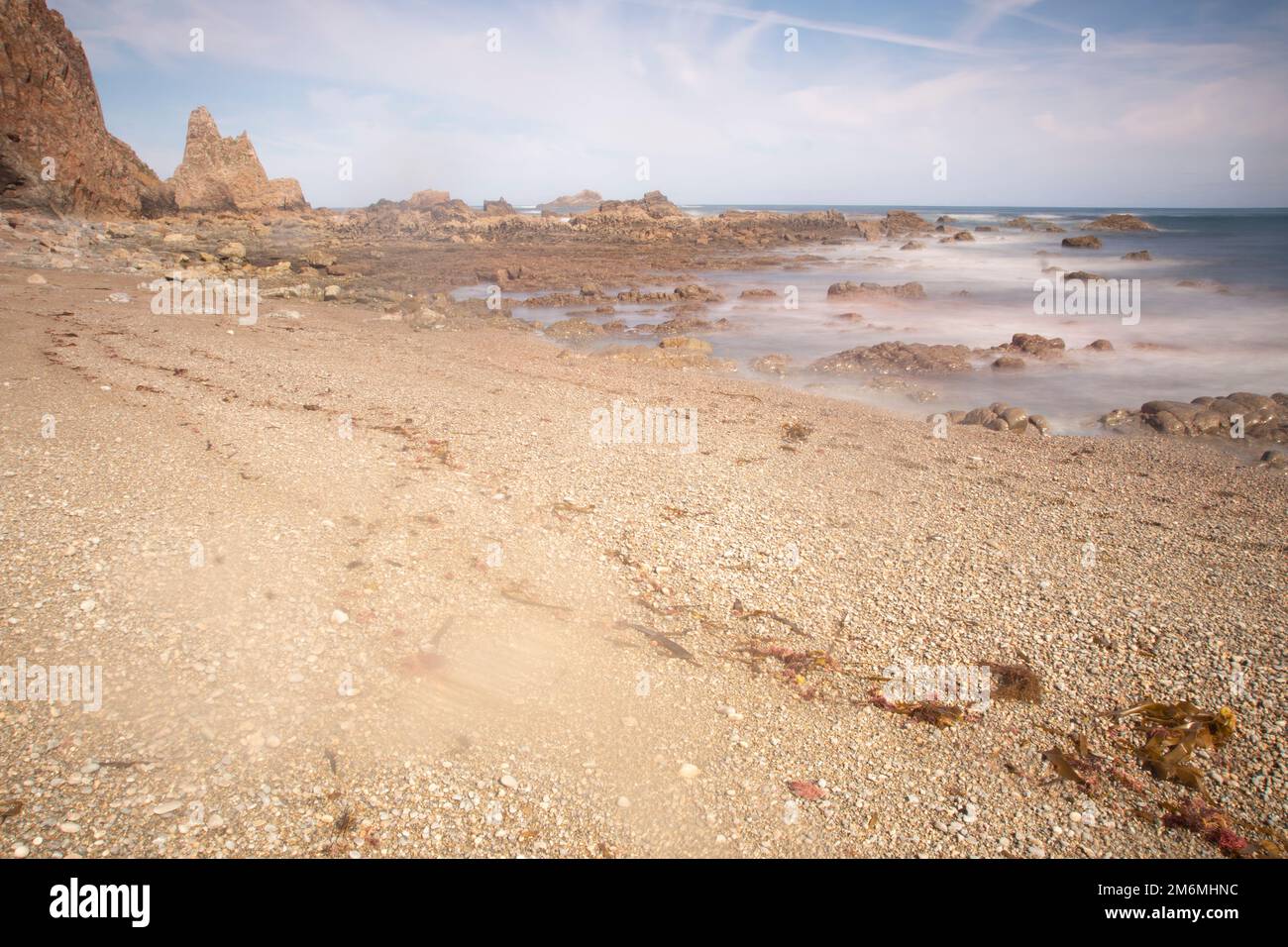 Rock formations in a stoney beach in Asturias, Spain Stock Photo - Alamy