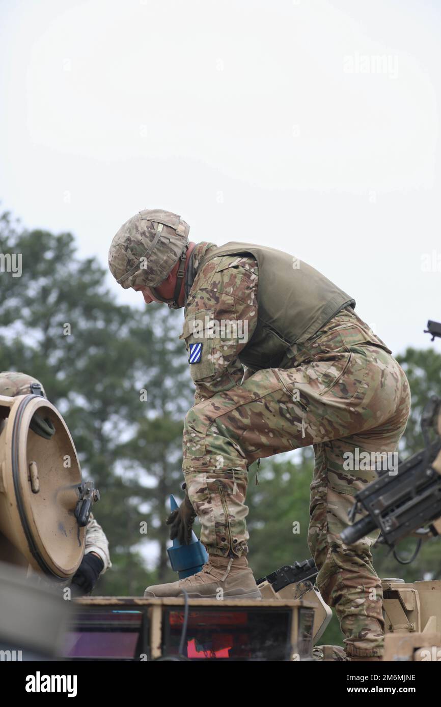 U.S. Army Sgt. Colby J. Kuberski, an M1 armor crewman gunner assigned ...