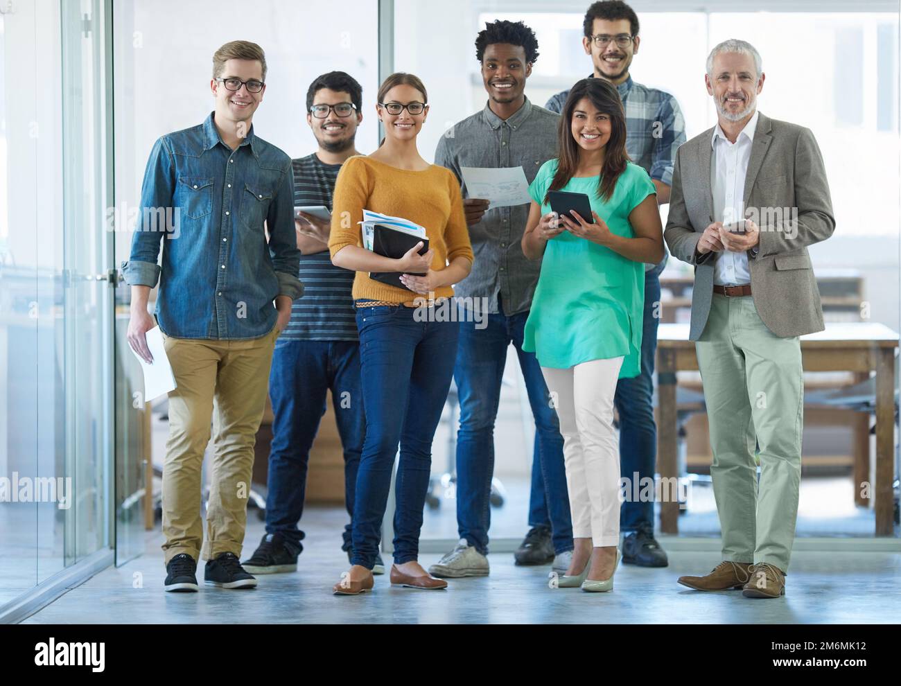 We succeed one each others strengths. Portrait of a diverse group of ...