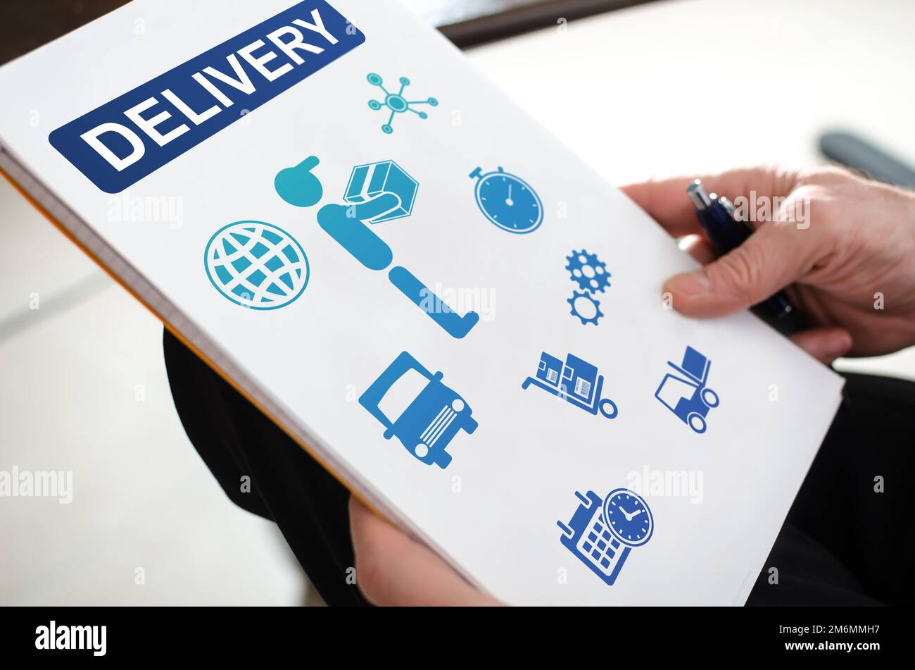 Delivery concept on a paper held by a hand Stock Photo - Alamy