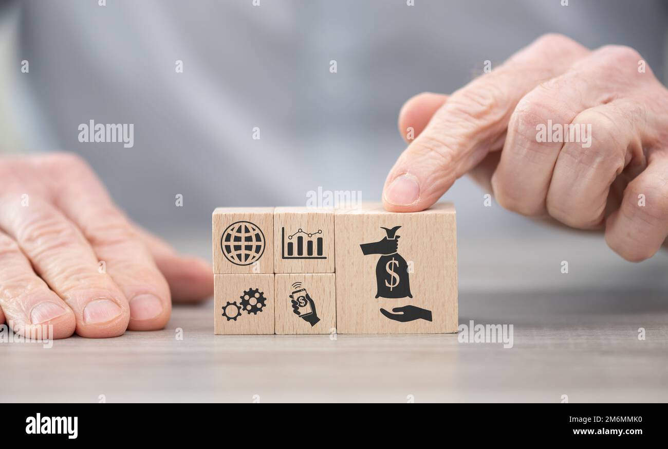 Wooden blocks with symbol of money transfer concept Stock Photo - Alamy