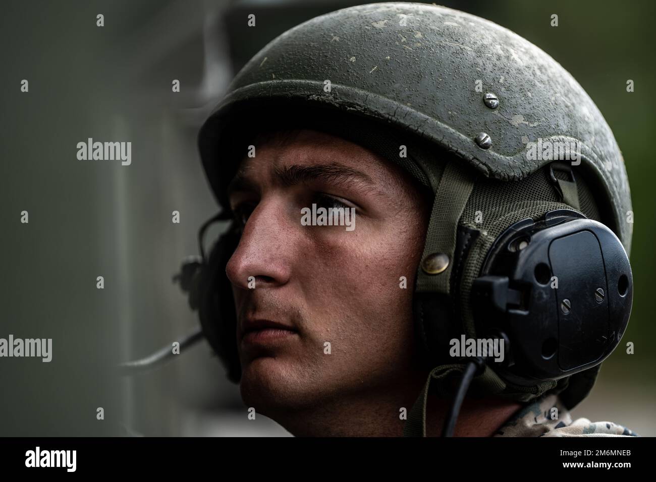 U.S. Marine Corps Corporal Zachary Godwin, a crewman with Kilo Battery ...