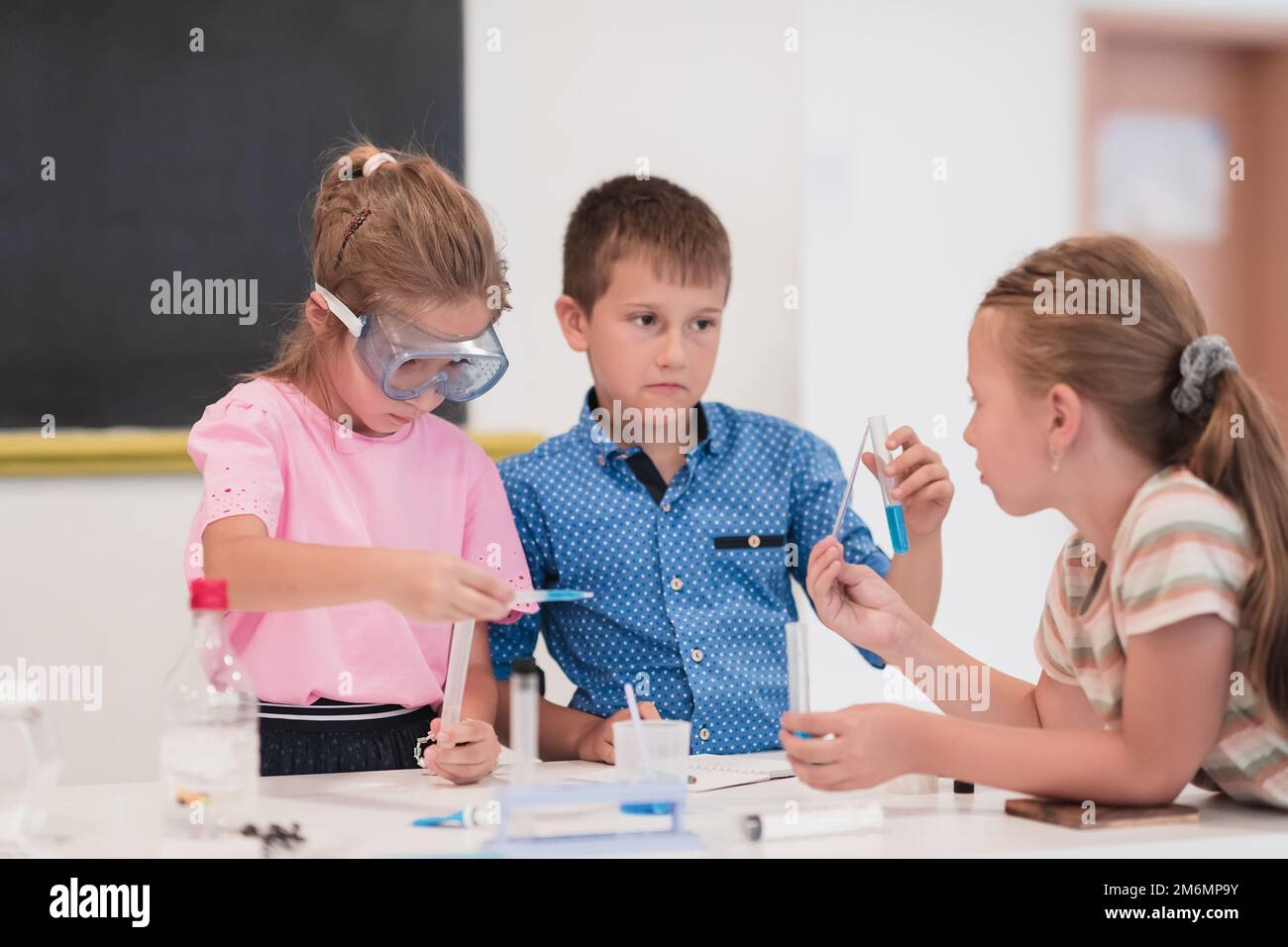 Elementary School Science Classroom: Enthusiastic Teacher Explains ...