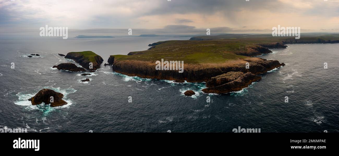 A drone panorama of the cliffs of Erris Head on the northern tip of the ...