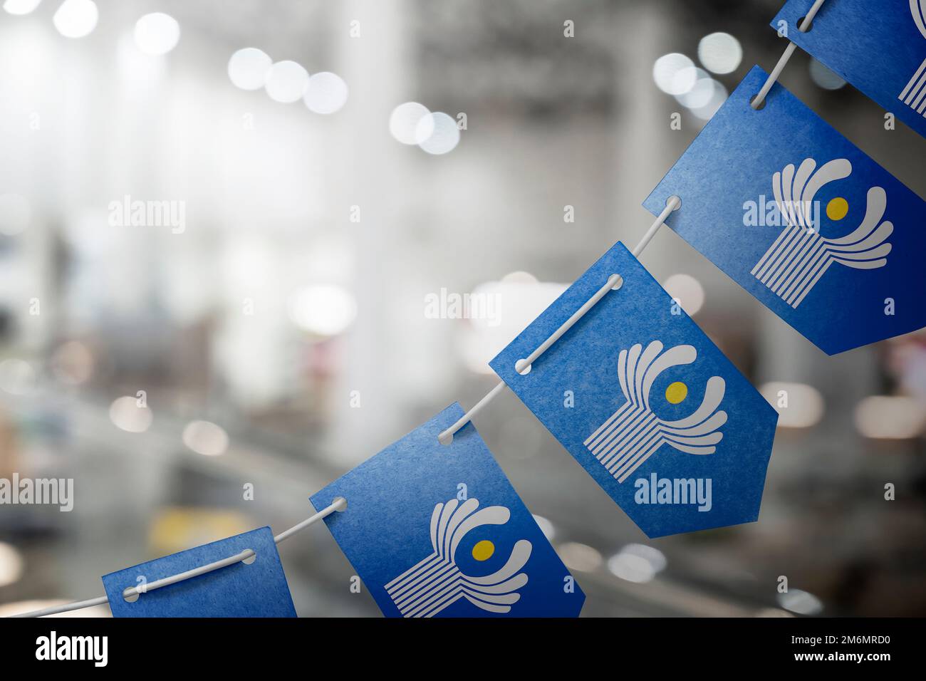 A garland of CIS national flags on an abstract blurred background Stock ...
