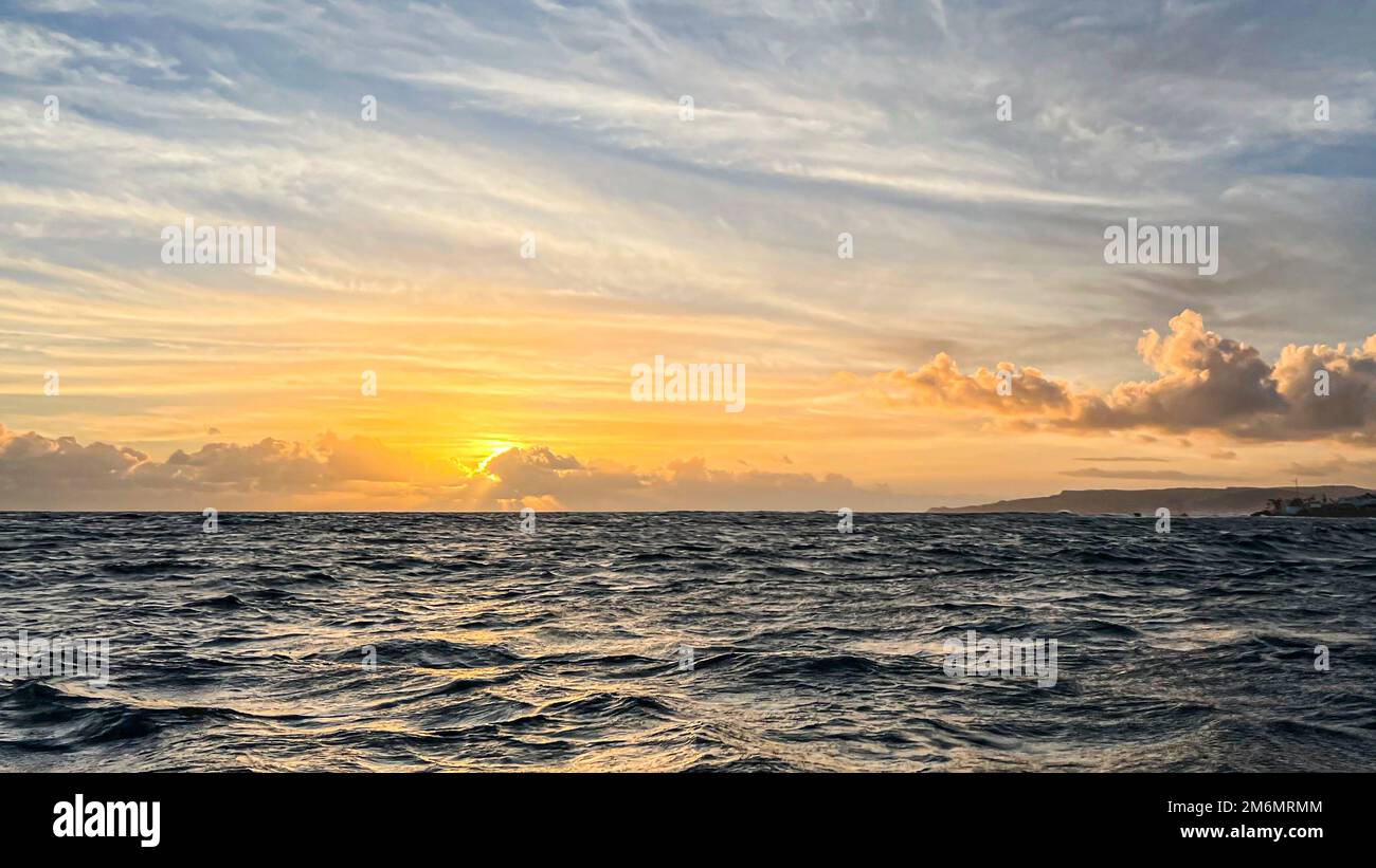 Hazy sunset over pacific ocean in Ensenada Mexico Stock Photo - Alamy