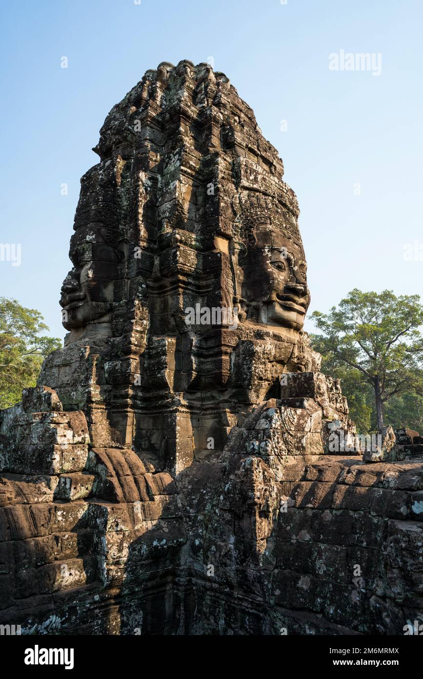 Angkor bayon giant statues Stock Photo - Alamy
