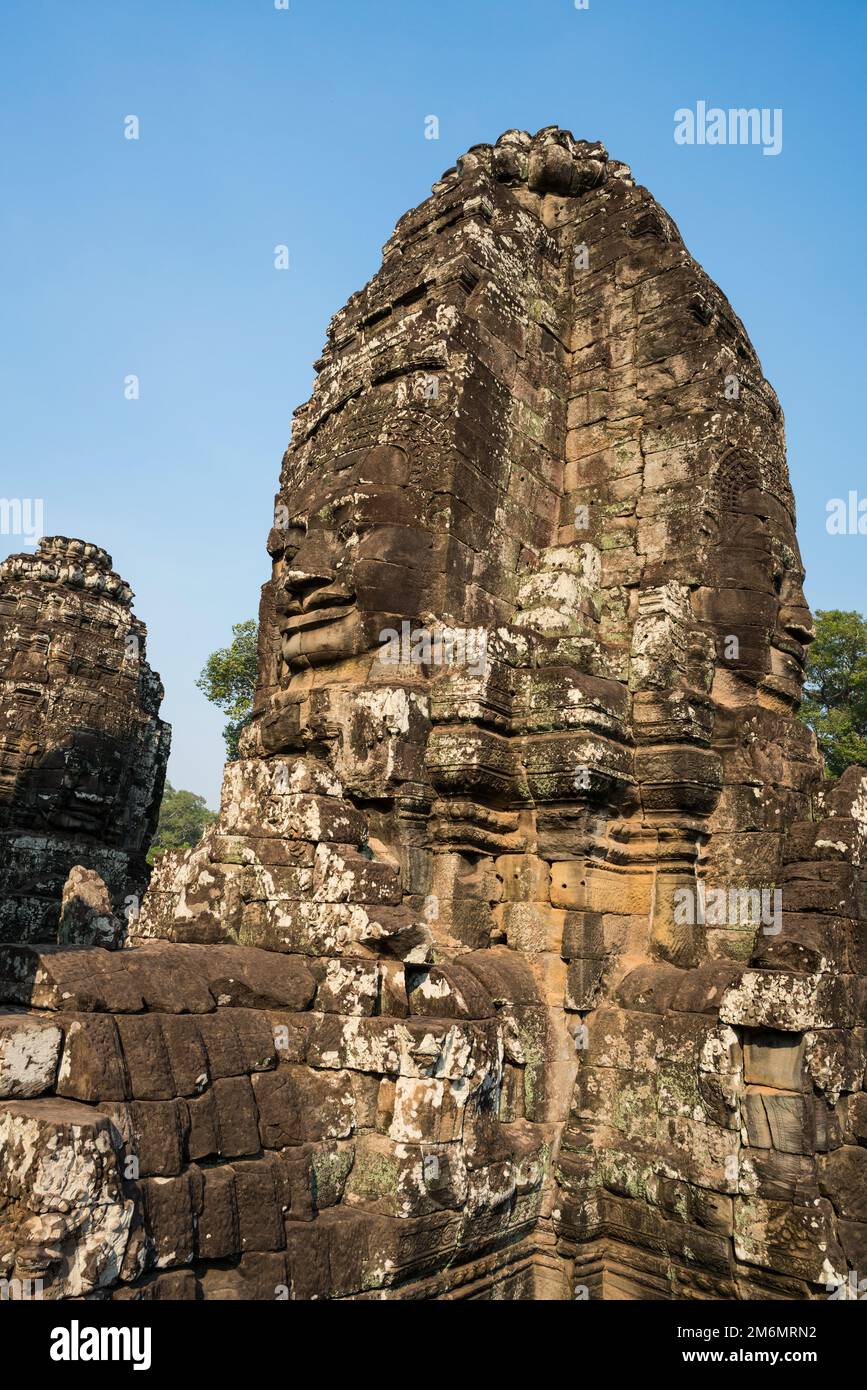 Angkor bayon giant statues Stock Photo - Alamy