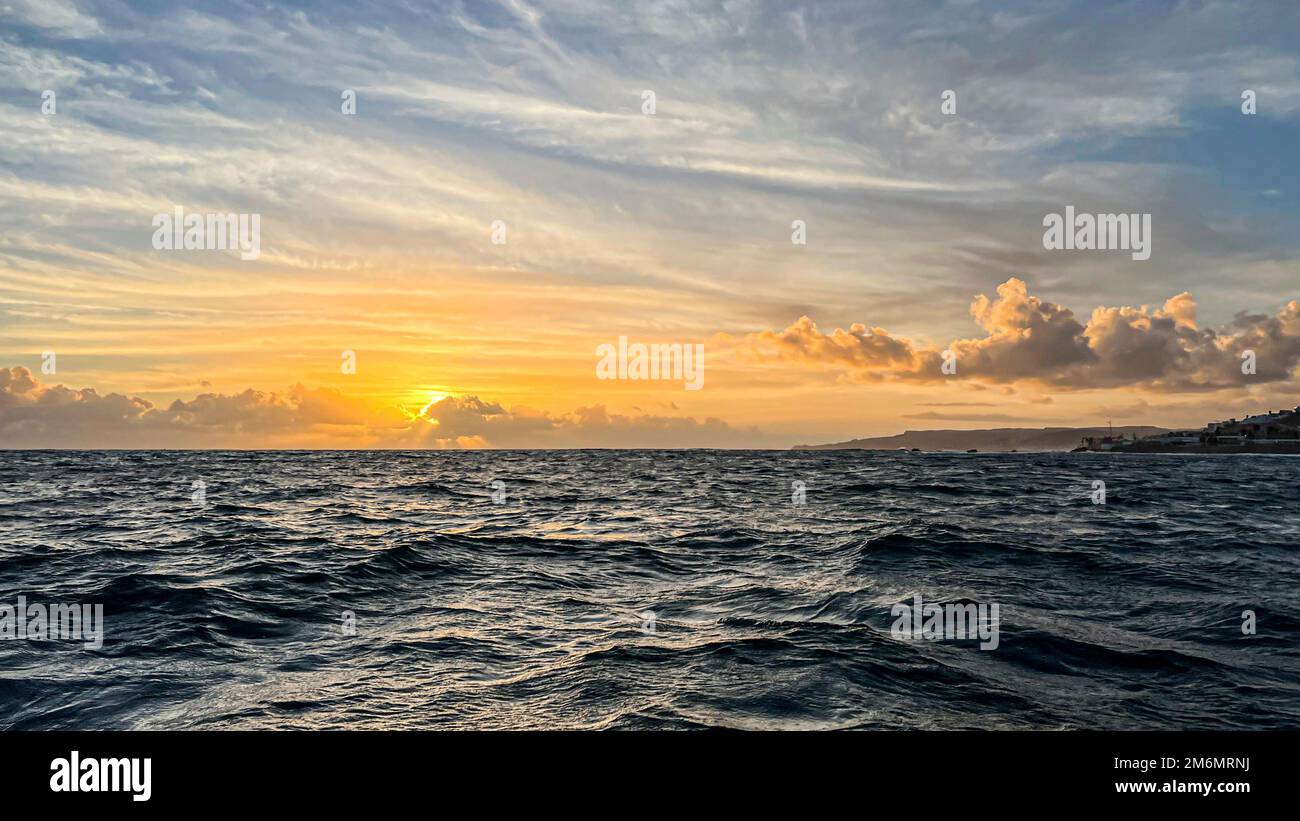 Hazy sunset over pacific ocean in Ensenada Mexico Stock Photo - Alamy
