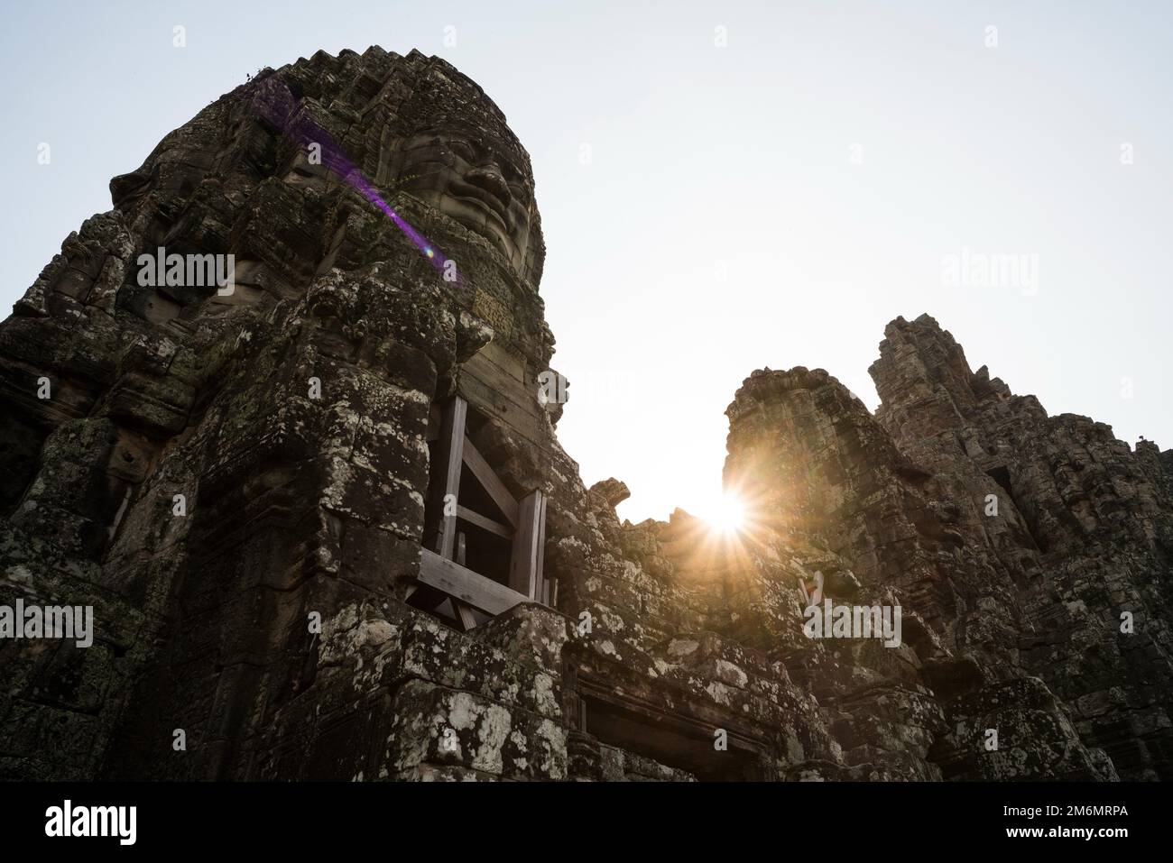 Angkor bayon giant statues Stock Photo - Alamy