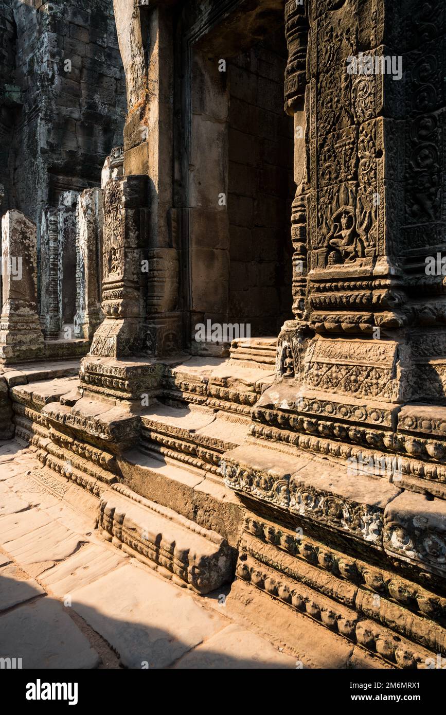 Angkor bayon giant statues Stock Photo - Alamy