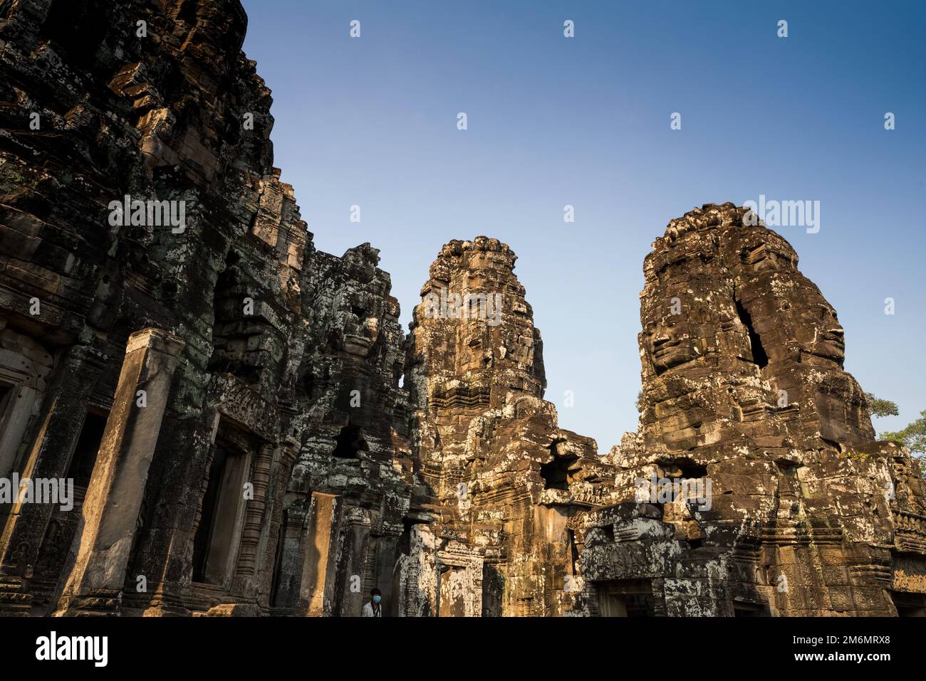 Angkor bayon giant statues Stock Photo - Alamy