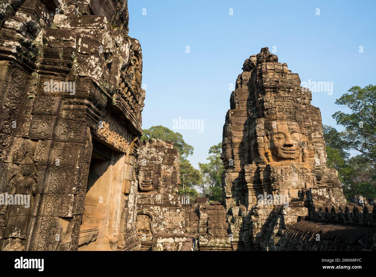 Angkor bayon giant statues Stock Photo - Alamy