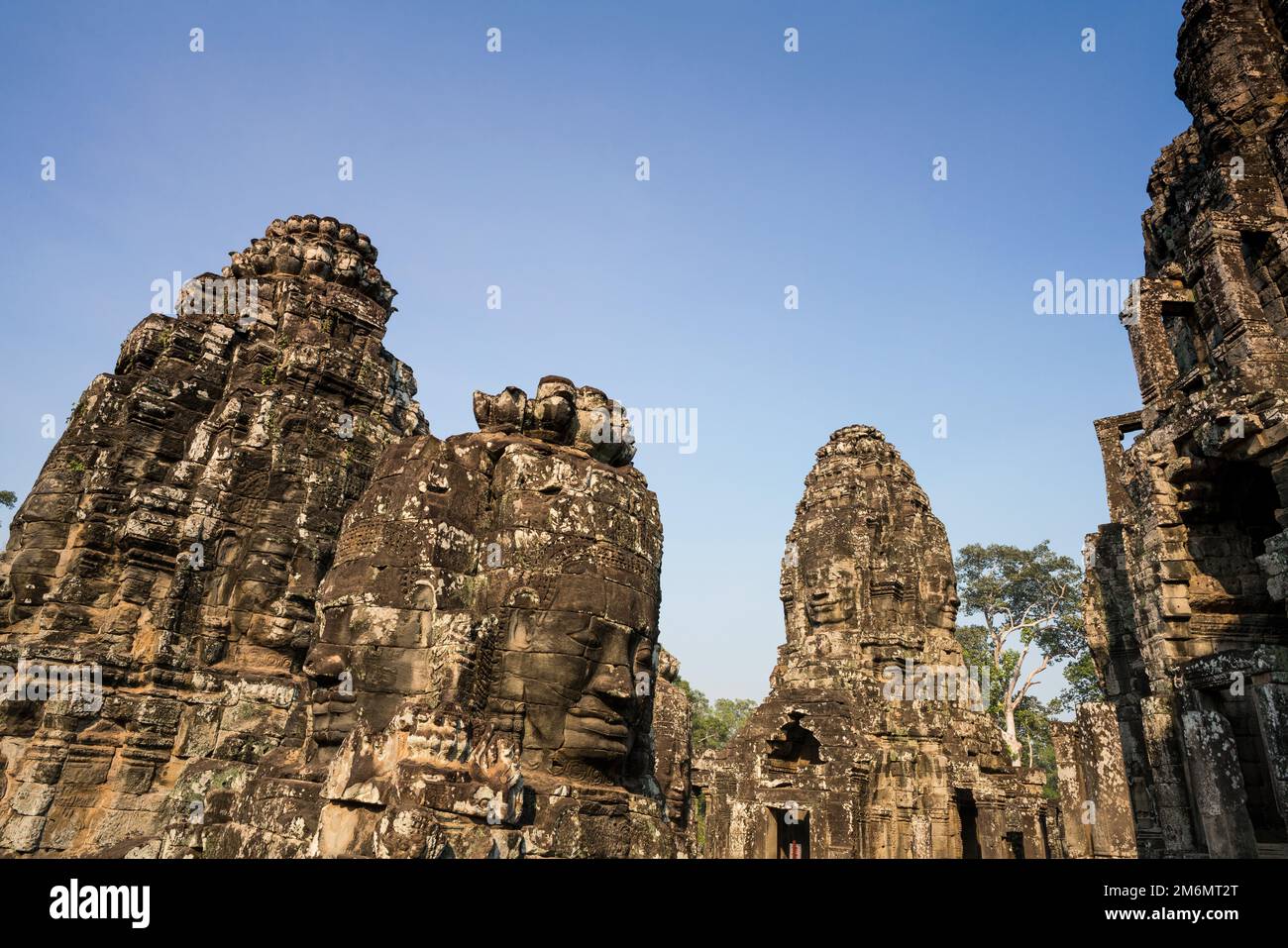 Angkor bayon giant statues Stock Photo - Alamy
