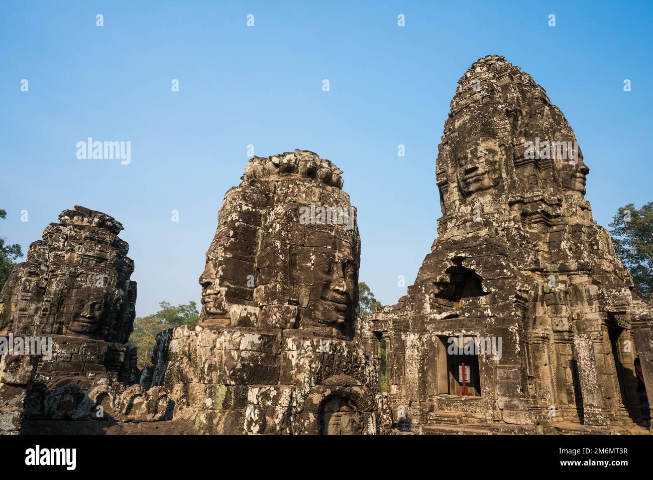 Angkor bayon giant statues Stock Photo - Alamy